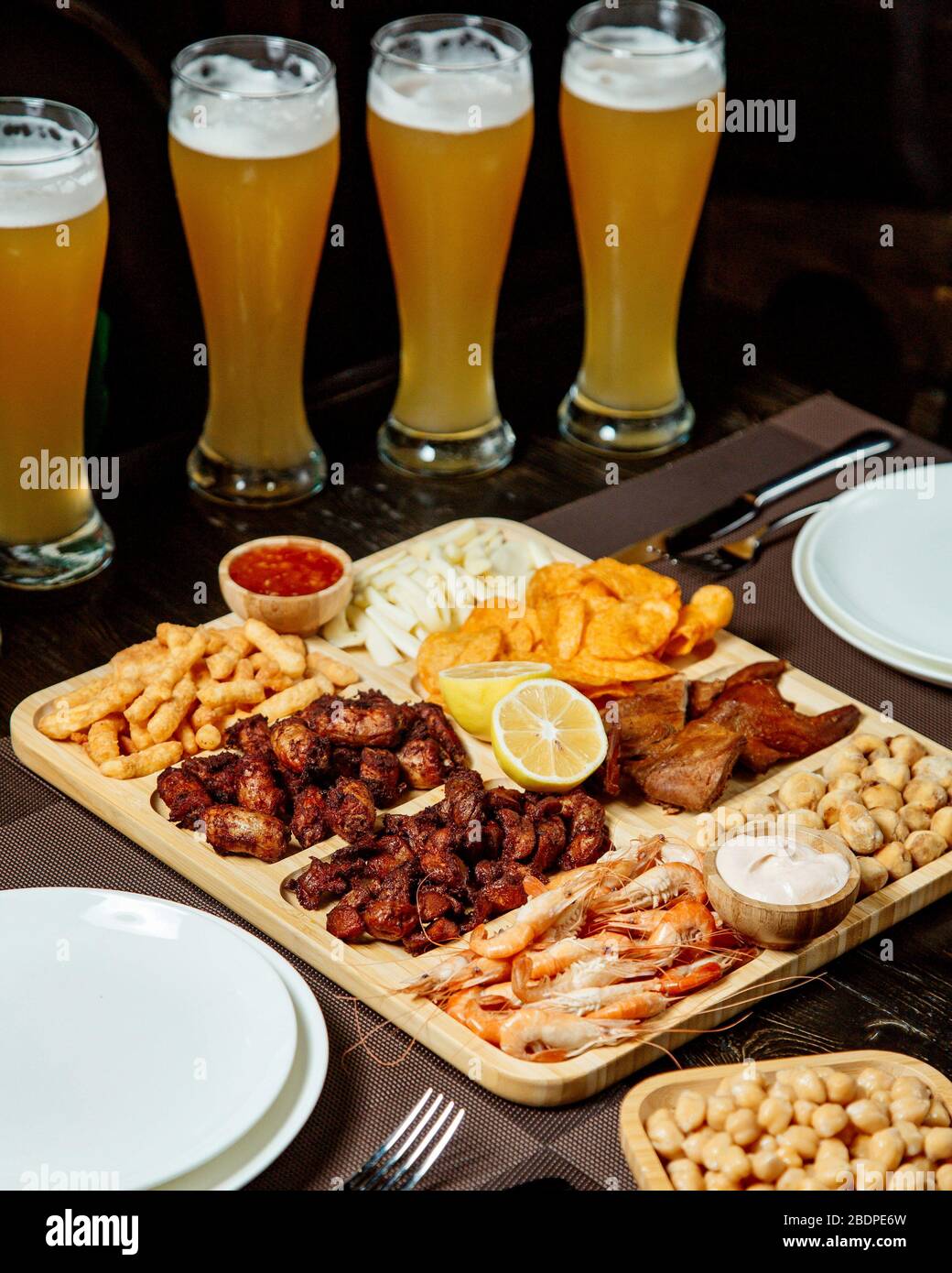 beer set with various snacks and lots of beer Stock Photo - Alamy