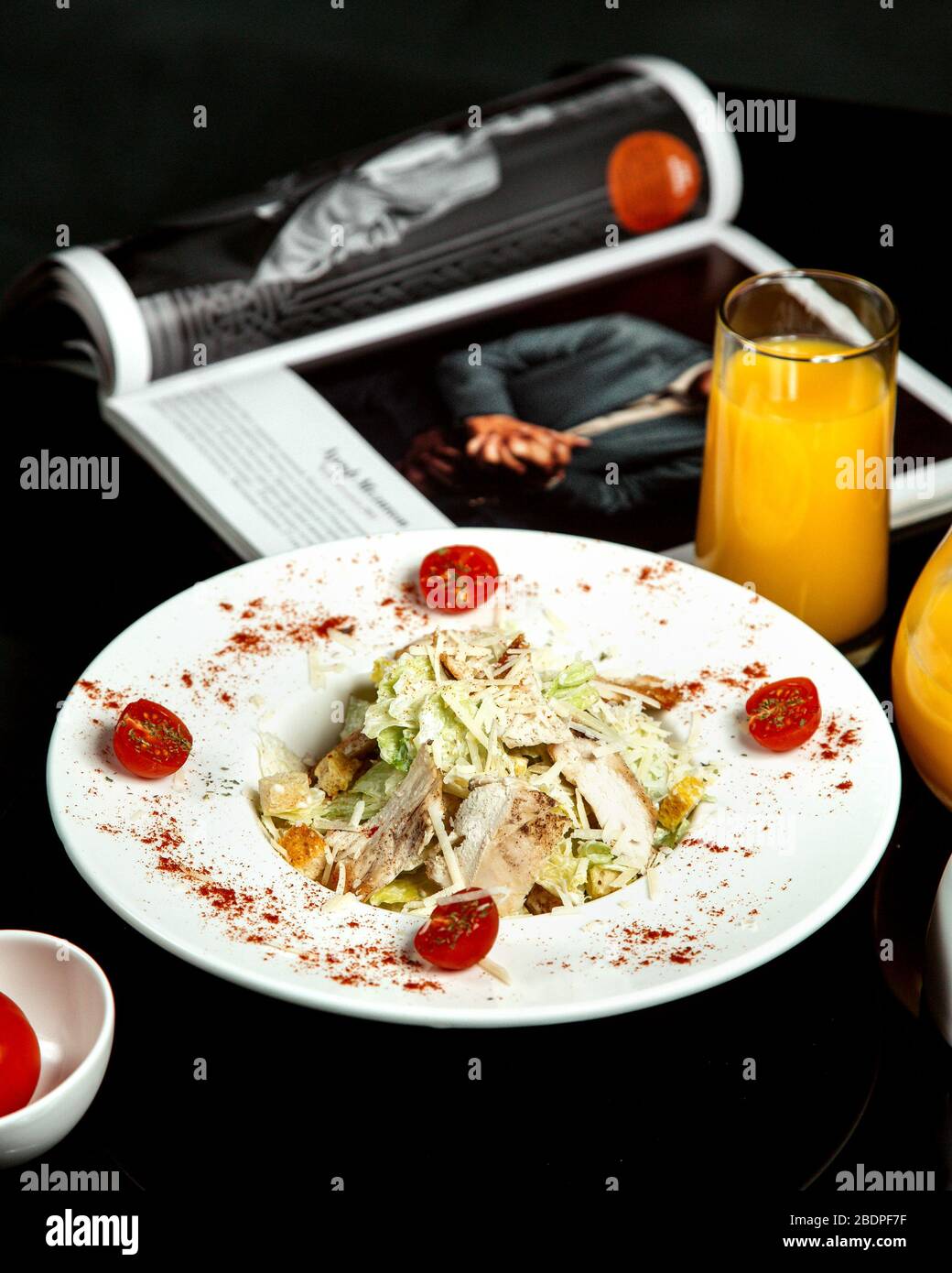 caesar salad with orange juice Stock Photo - Alamy