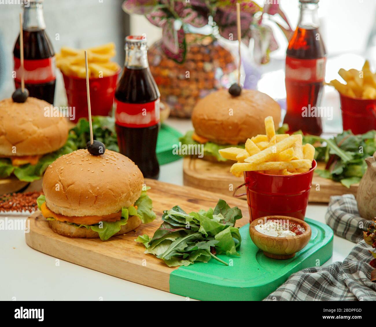cheeseburger with fries and cola Stock Photo - Alamy