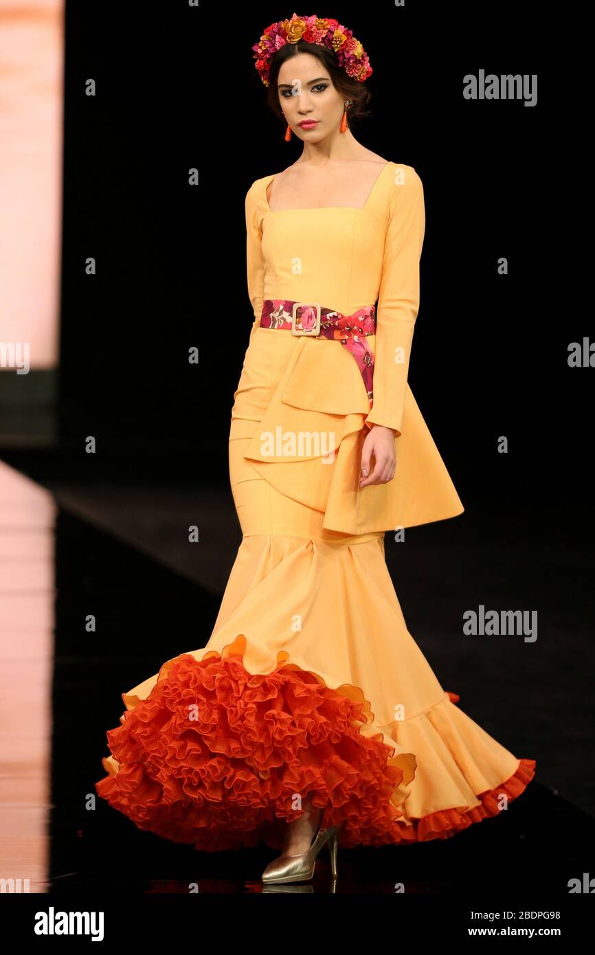 SEVILLA, SPAIN - JAN 30: Model wearing a dress from the En Tierra ...