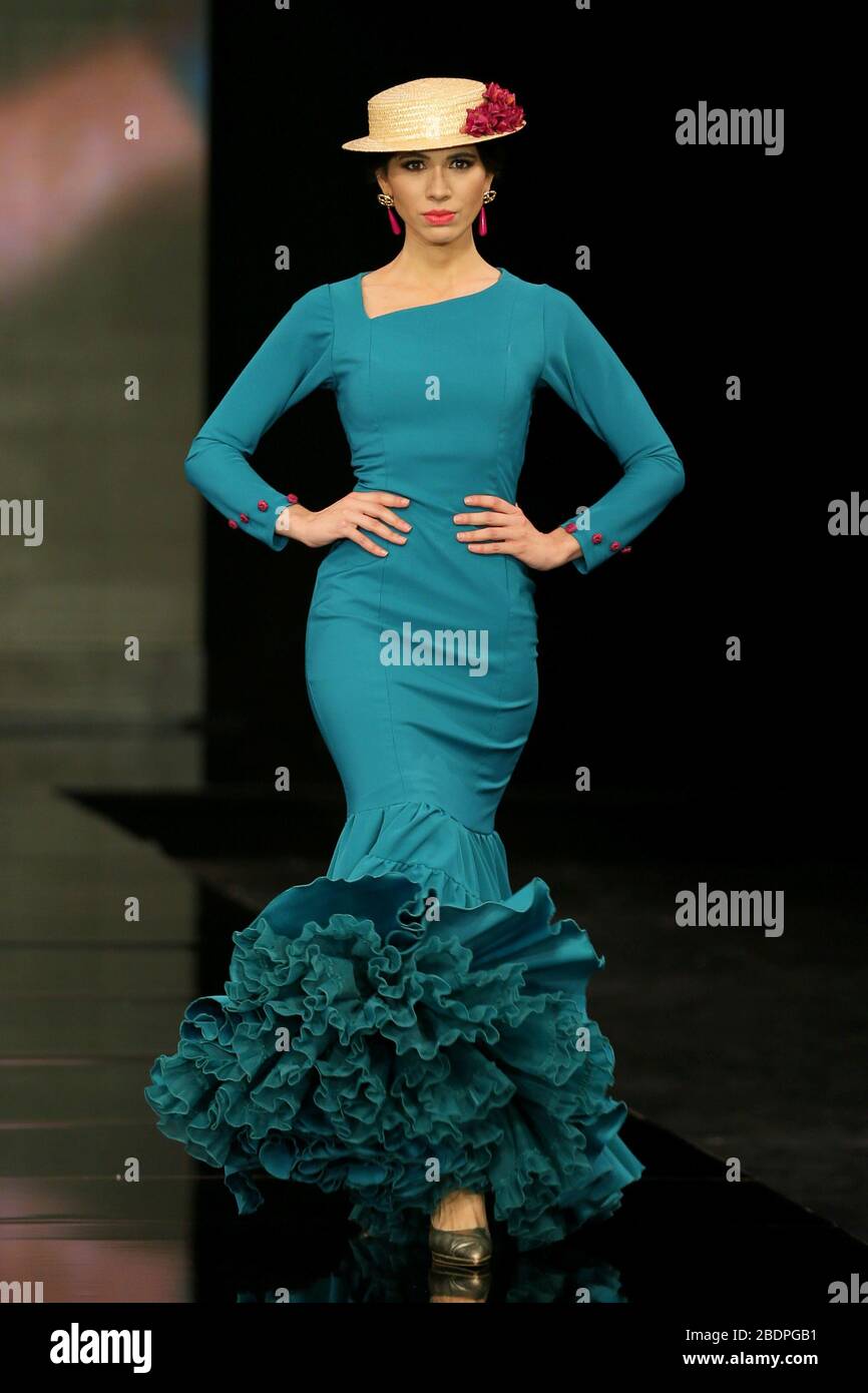 SEVILLA, SPAIN - JAN 30: Model wearing a dress from the En Tierra ...