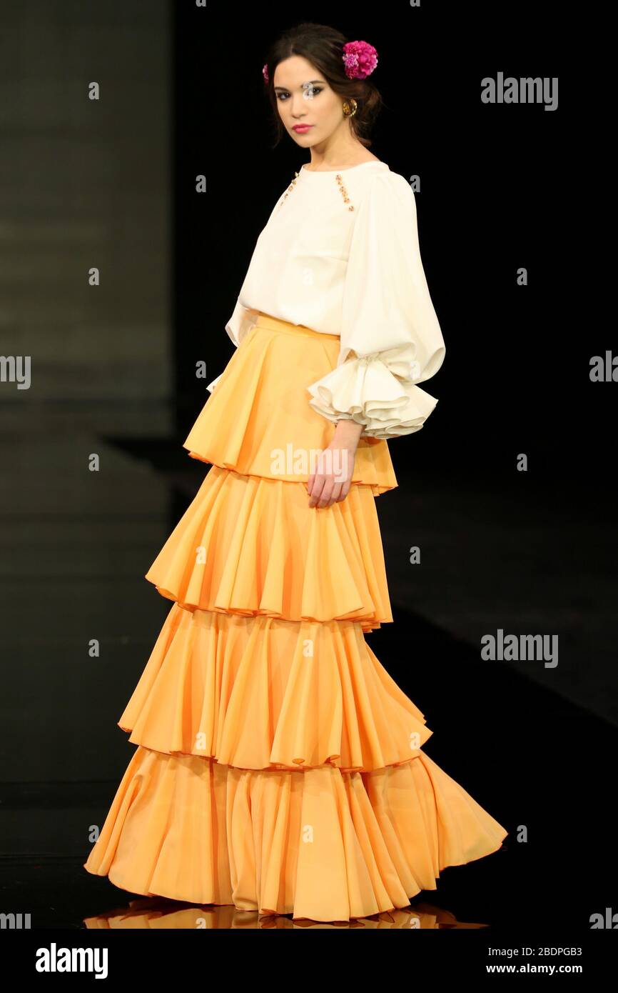 SEVILLA, SPAIN - JAN 30: Model wearing a dress from the En Tierra ...