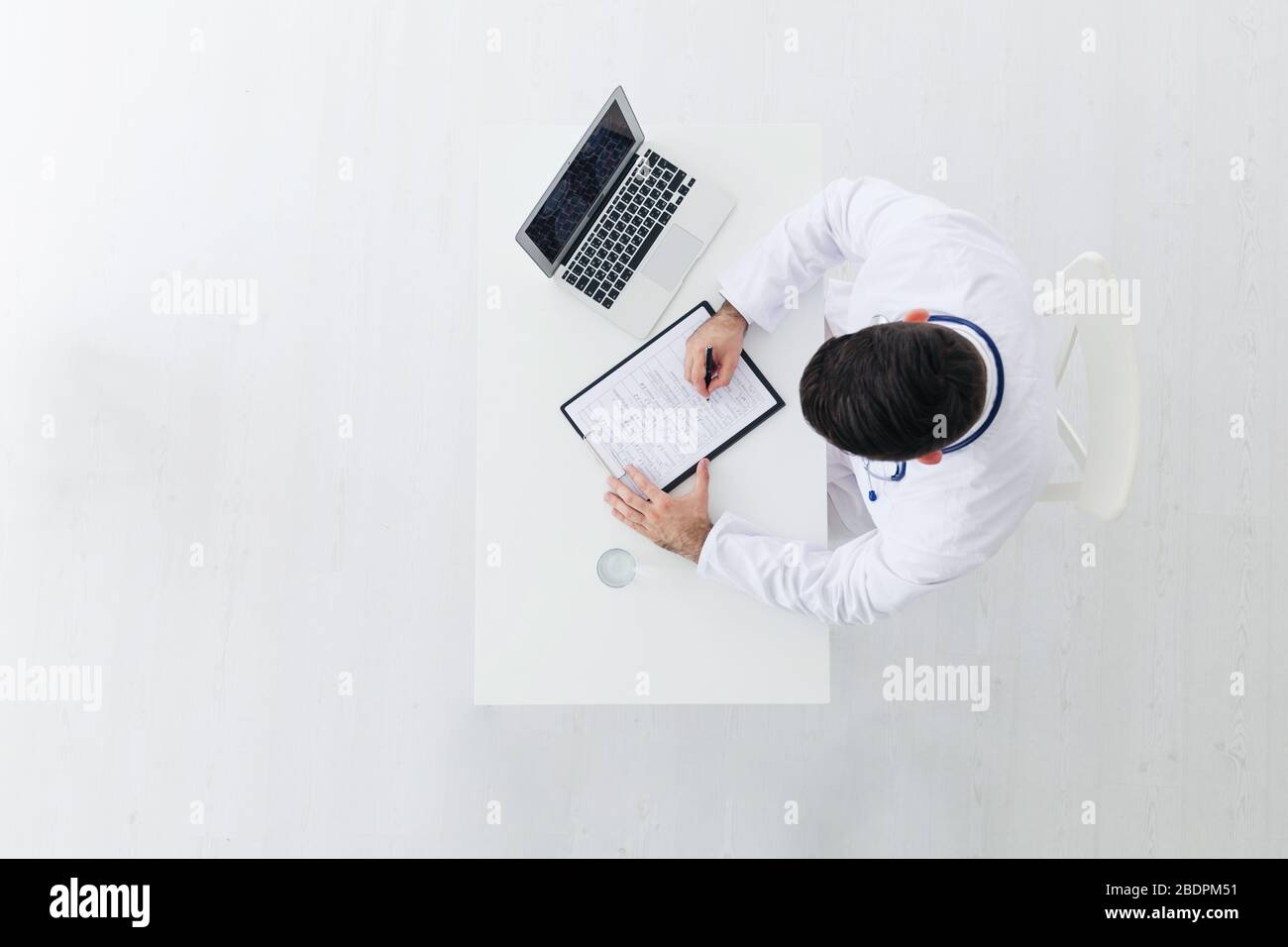 Top view male doctor holding hi-res stock photography and images - Alamy