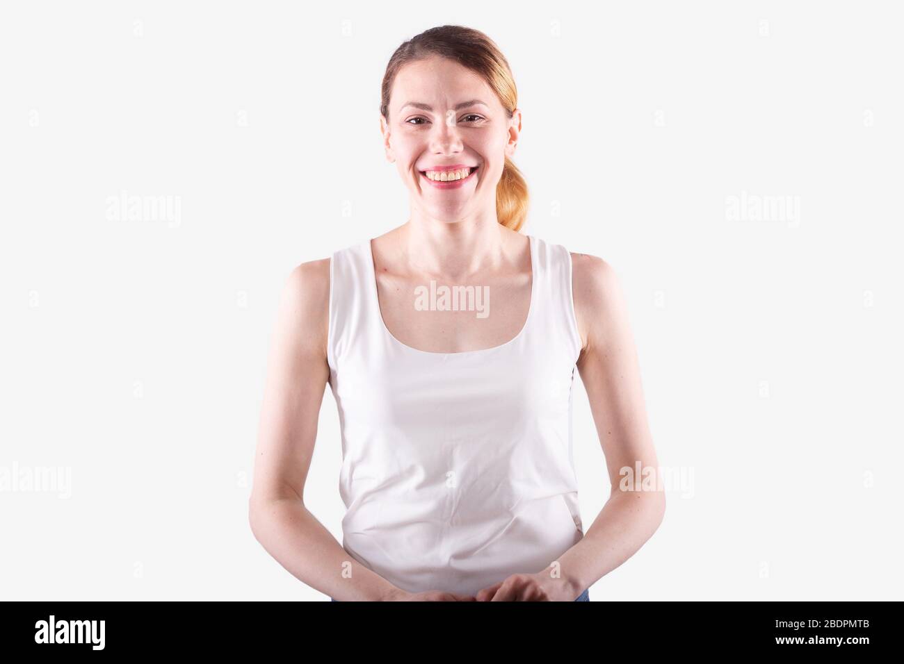 Caucasian woman lean physique smiling to camera. Isolated on white ...