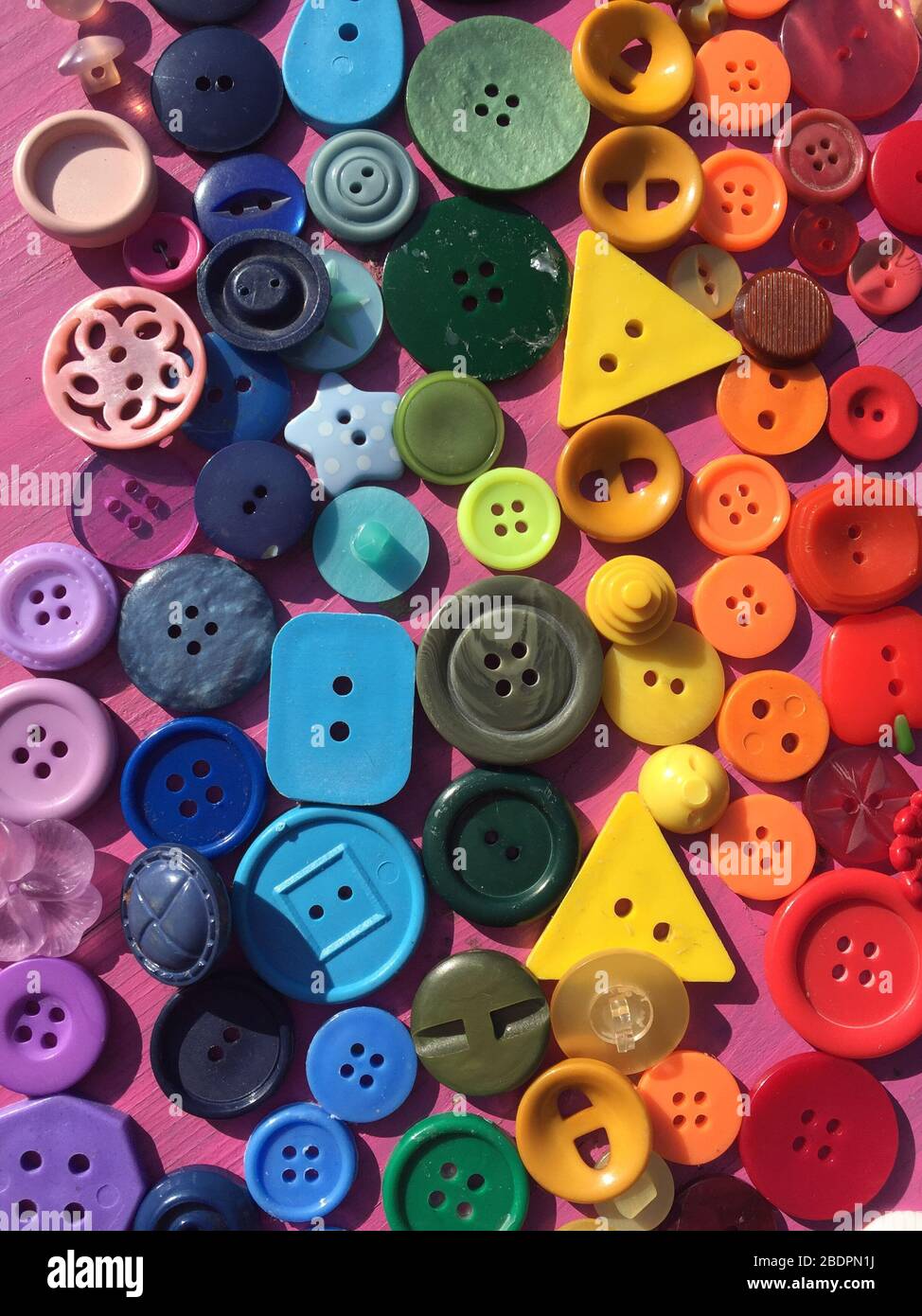 rainbow made of sewing buttons bright background - stock photo Stock ...