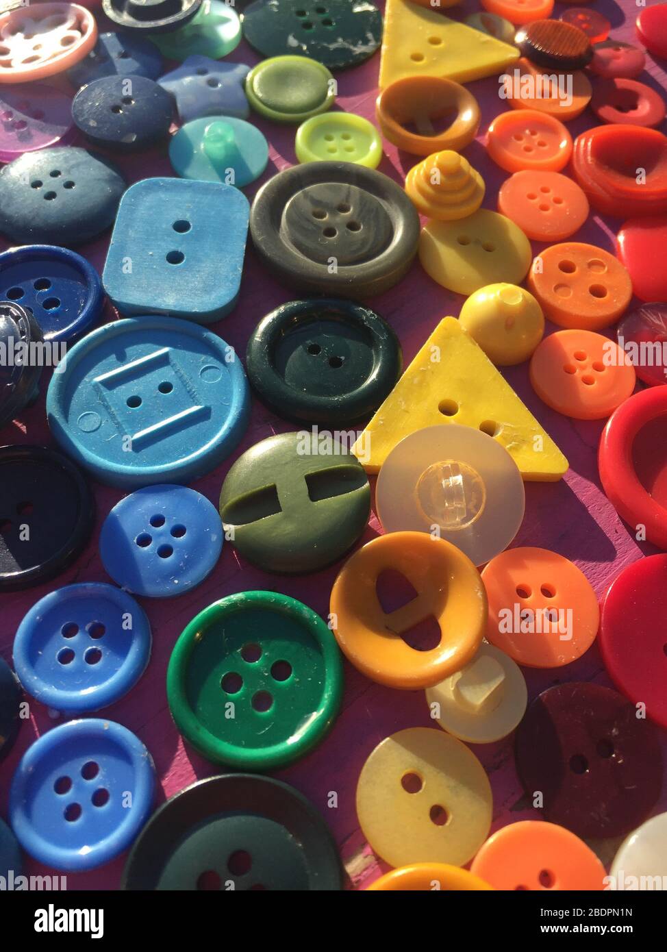 Sewing button rainbow hi-res stock photography and images - Alamy