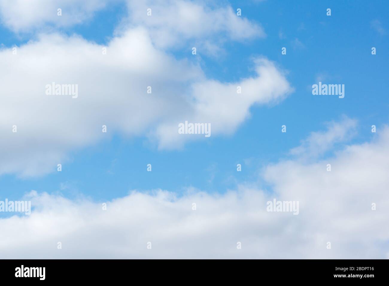 blue sky with flying white light clouds Stock Photo - Alamy