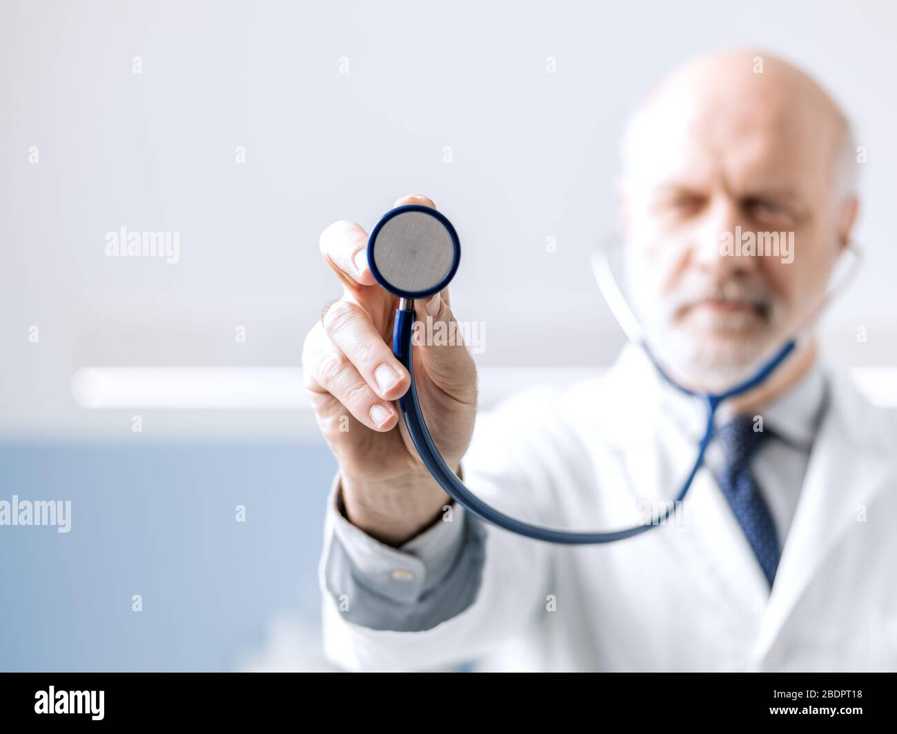 Professional doctor showing a stethoscope before a medical checkup ...