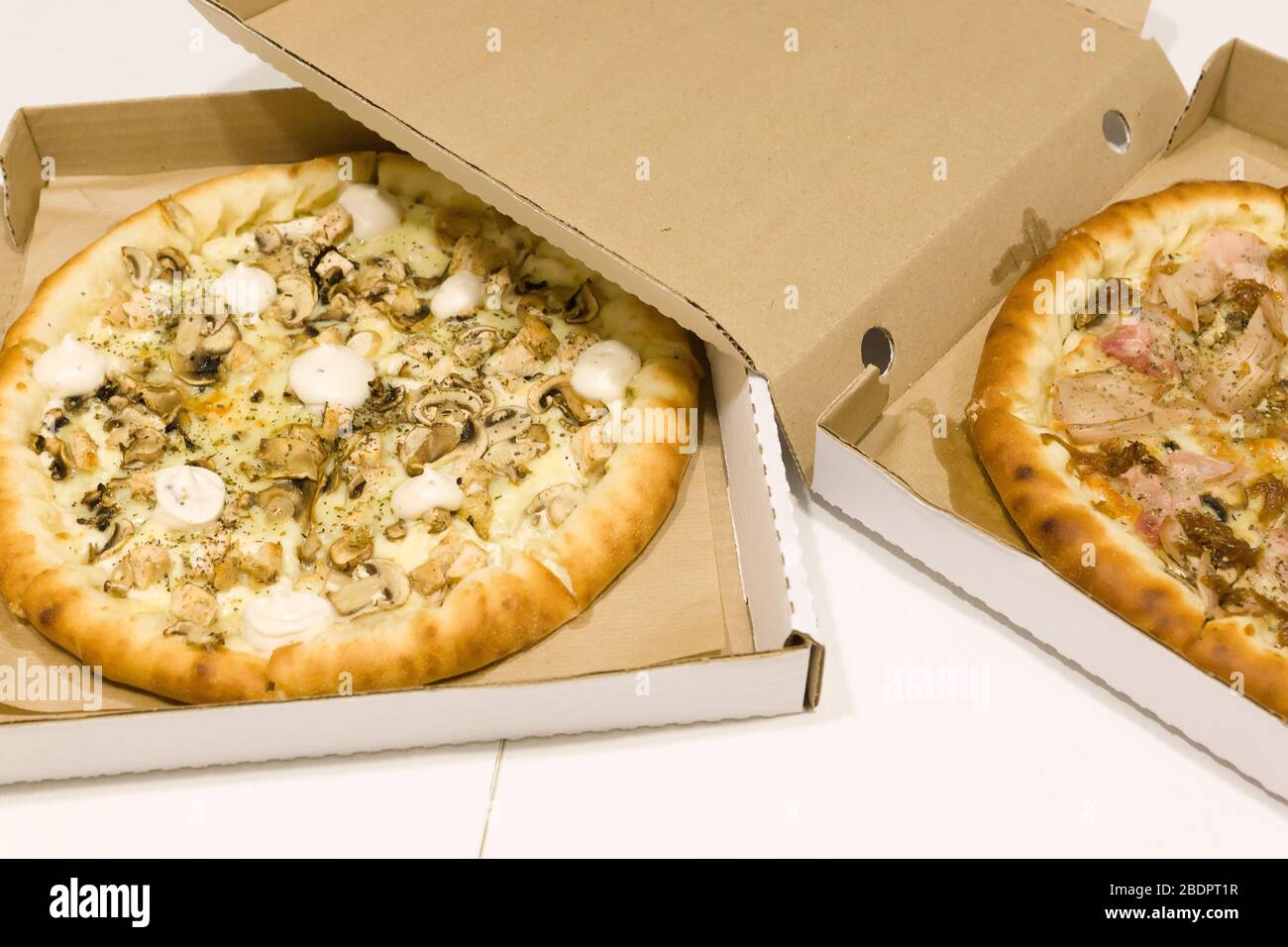 big pizza with mushrooms in a cardboard box Stock Photo - Alamy