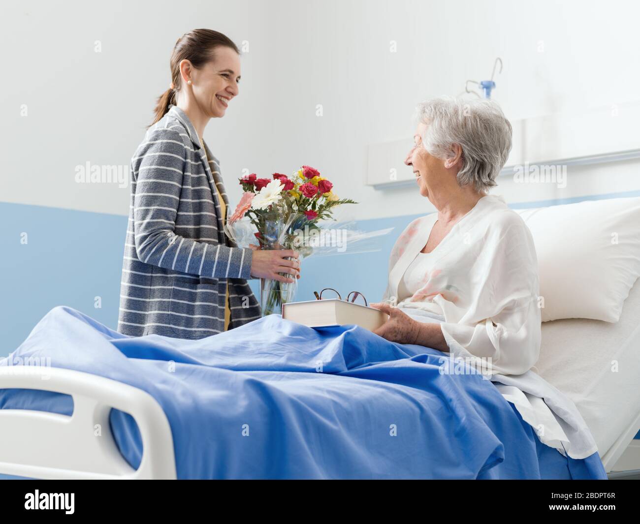 Hospital visit elderly flowers hi-res stock photography and images - Alamy
