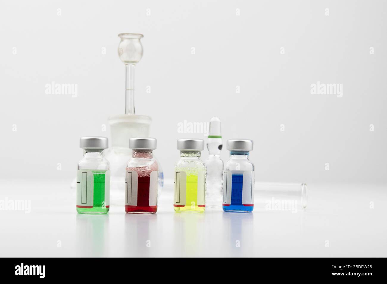 Glass vials containing coloured solutions as a medical treatment for ...