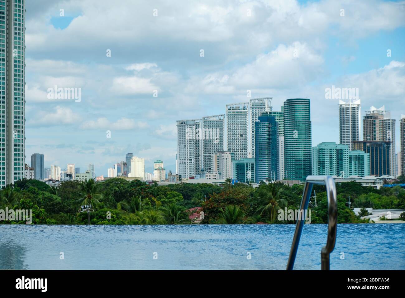 View of the city of Manila from the pool of the luxury five-star ...