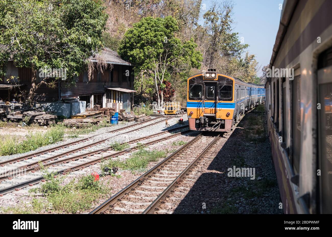 Diesel multiple unit of the local train is leaving from the station on ...