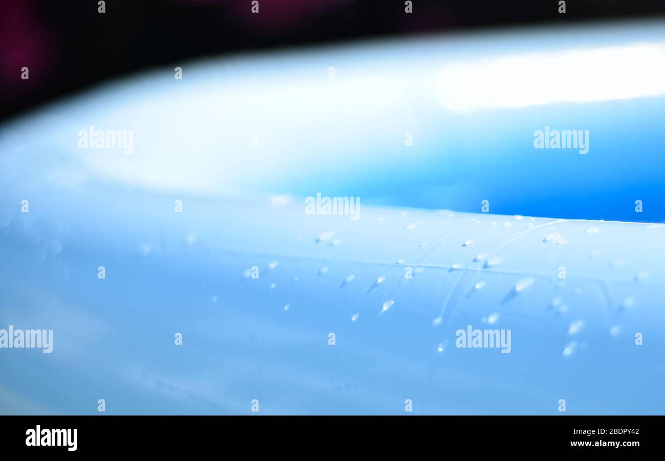 Waterdrops on inflatable swimming pool in garden on a summer day Stock ...