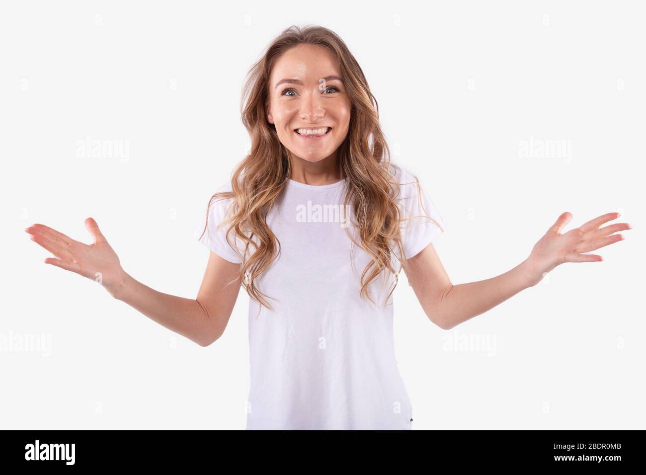 Happy woman broadly smiles. Hands in welcom pose. Pleasant surprise ...
