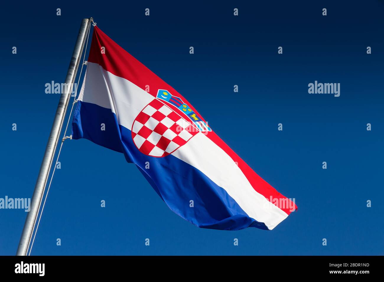 National flag of Croatia. In the crown above the checkered shield the ...