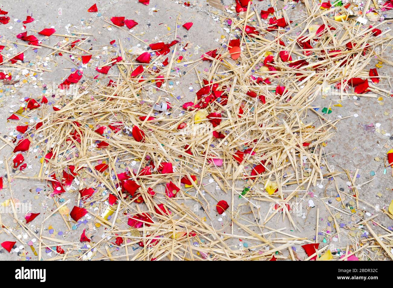 Straw, petals and confetti scattered on the floor after a celebration ...