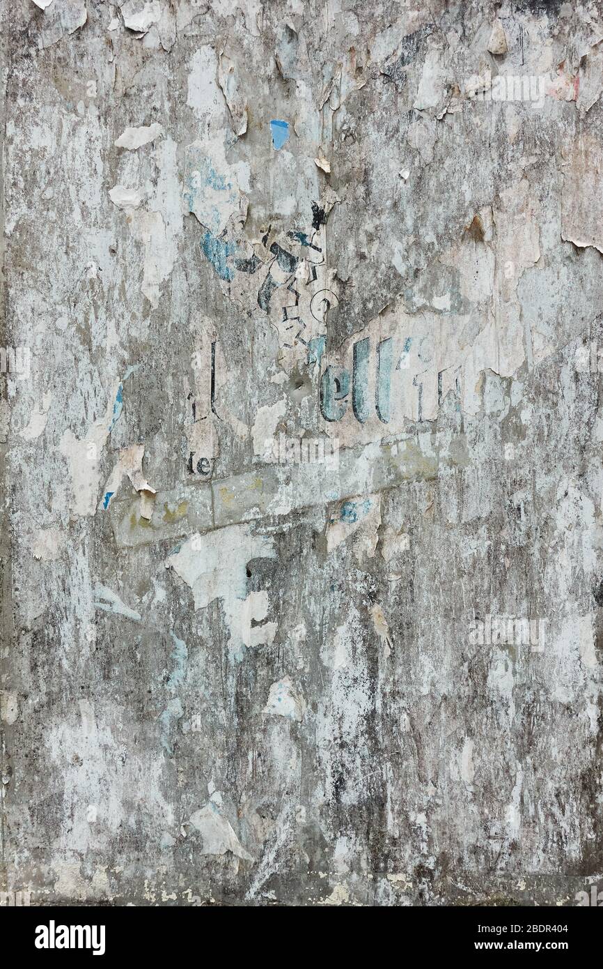 Street bulletin board with scraps of old posters - Textured background ...