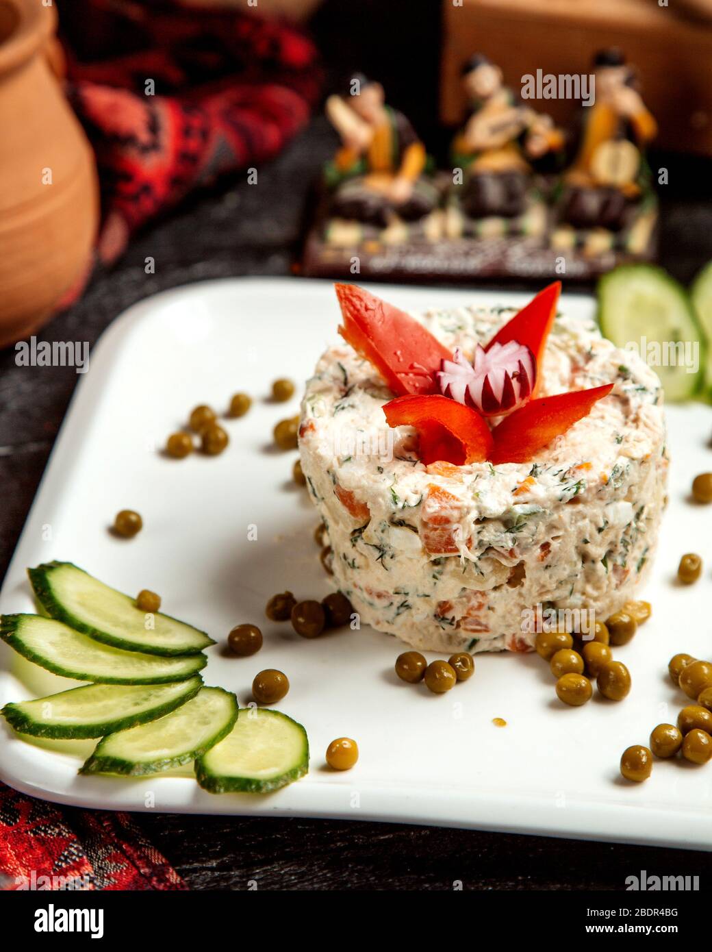 russian salad with side beans and sliced cucumber Stock Photo - Alamy