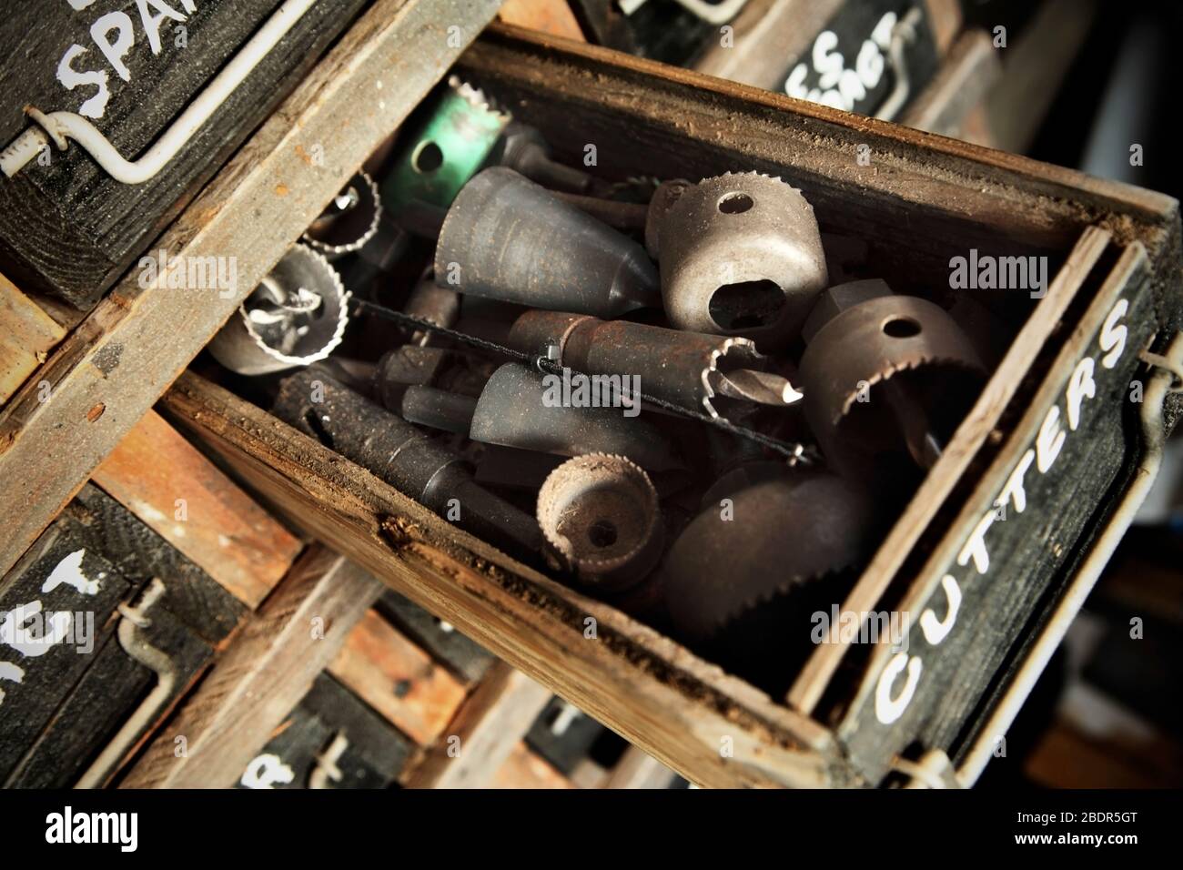Cutting tools in drawer of tool cabinet Stock Photo - Alamy