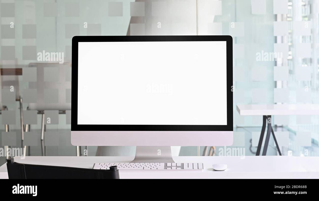 Photo of computer monitor with white blank screen putting on white ...