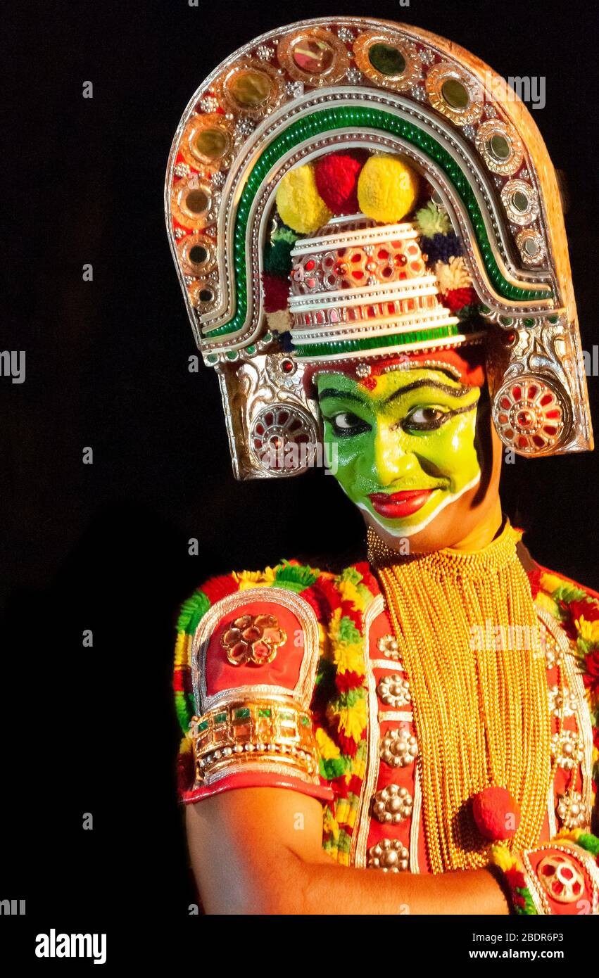 Traditional Indian Hindu dancer with painted face and exotic costume ...