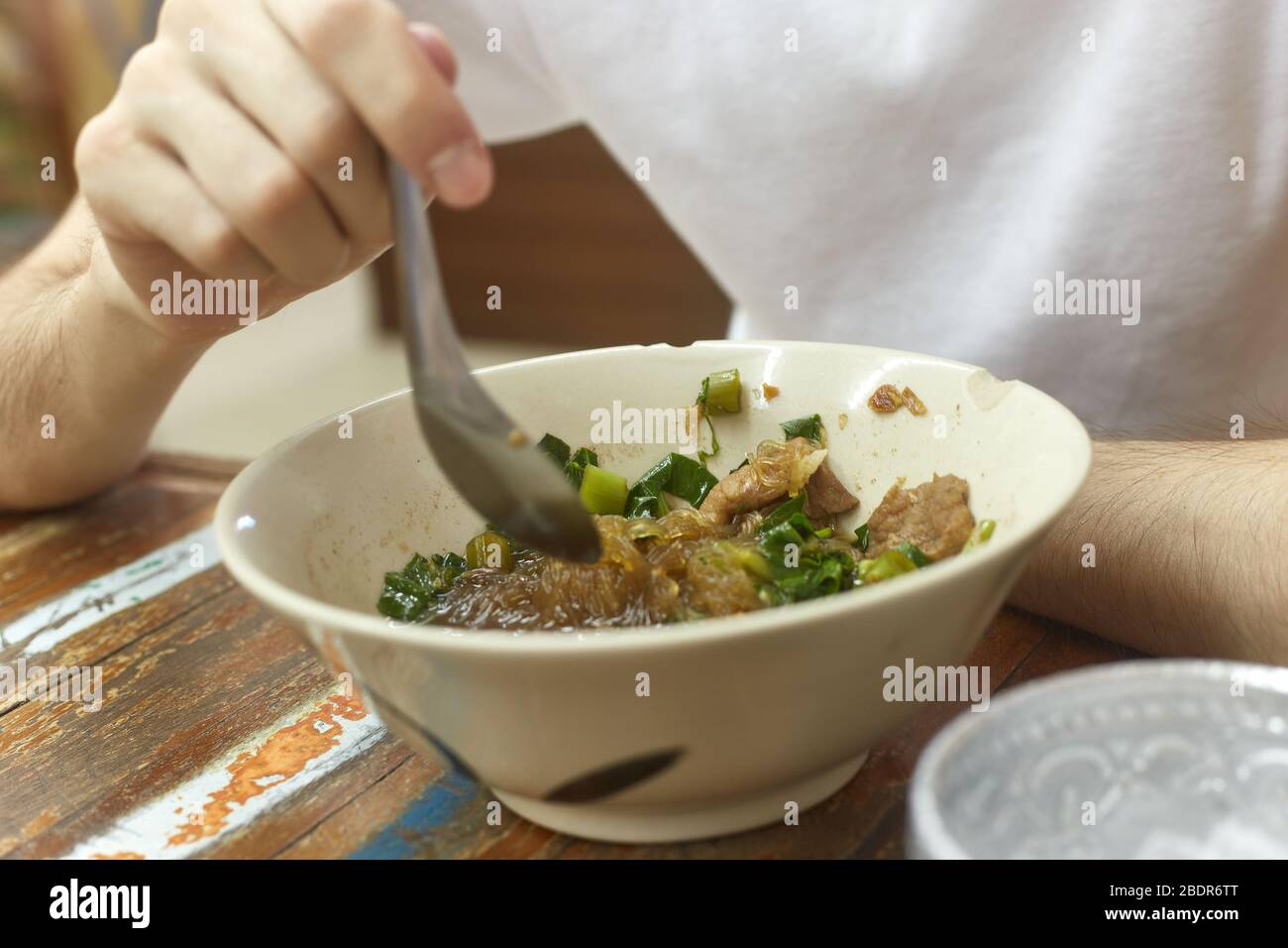 Chinese people eating rice hi-res stock photography and images - Alamy