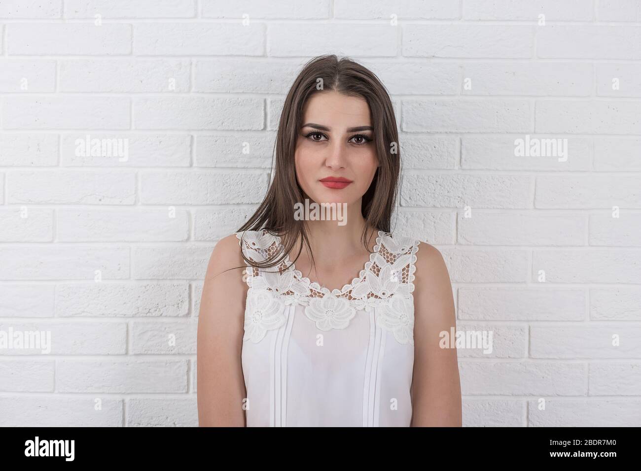 Business Woman Serious Isolated White Bricks Wall Background Smiling