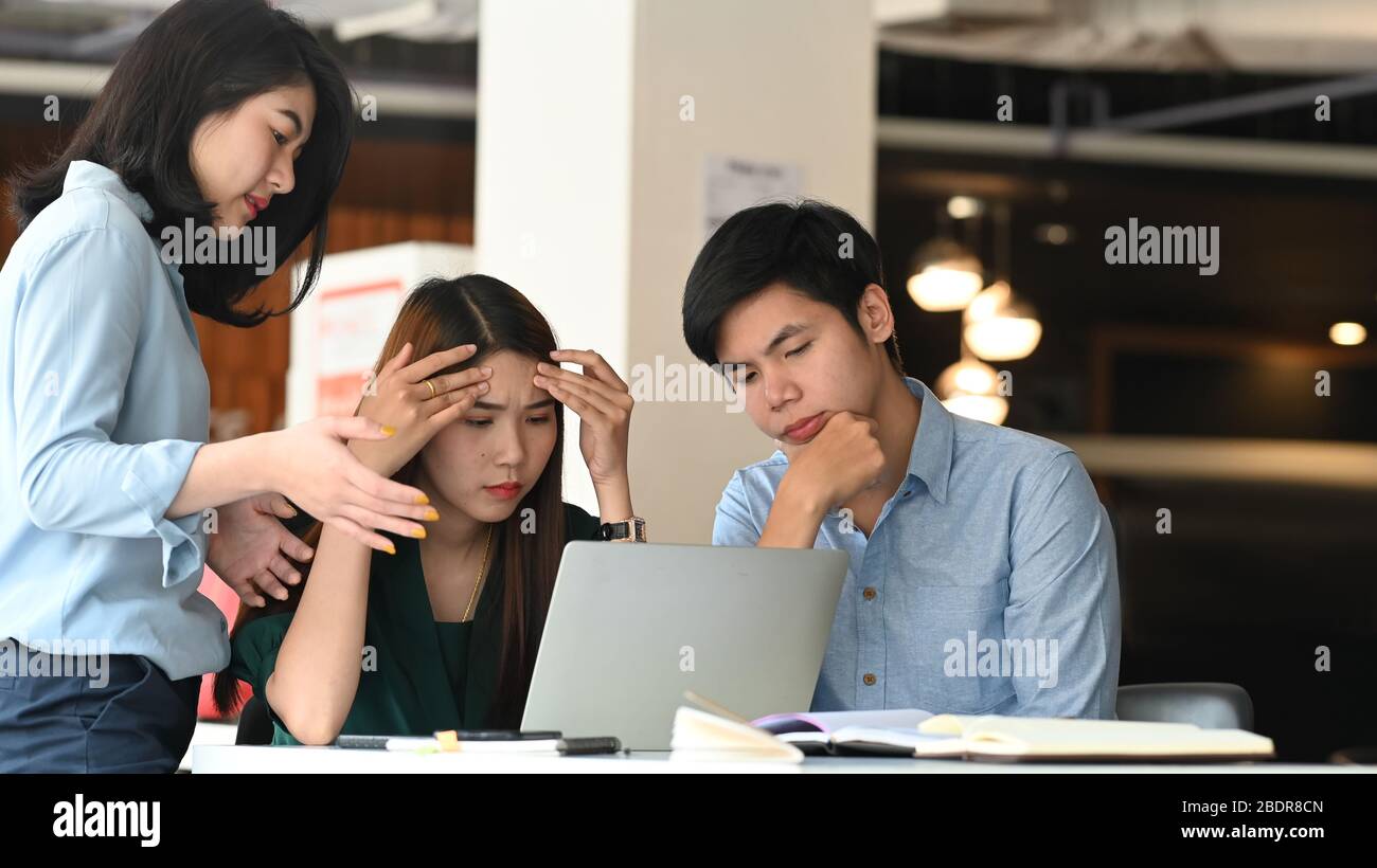 Photo of Ux Ui development team stressed while discussing/meeting ...
