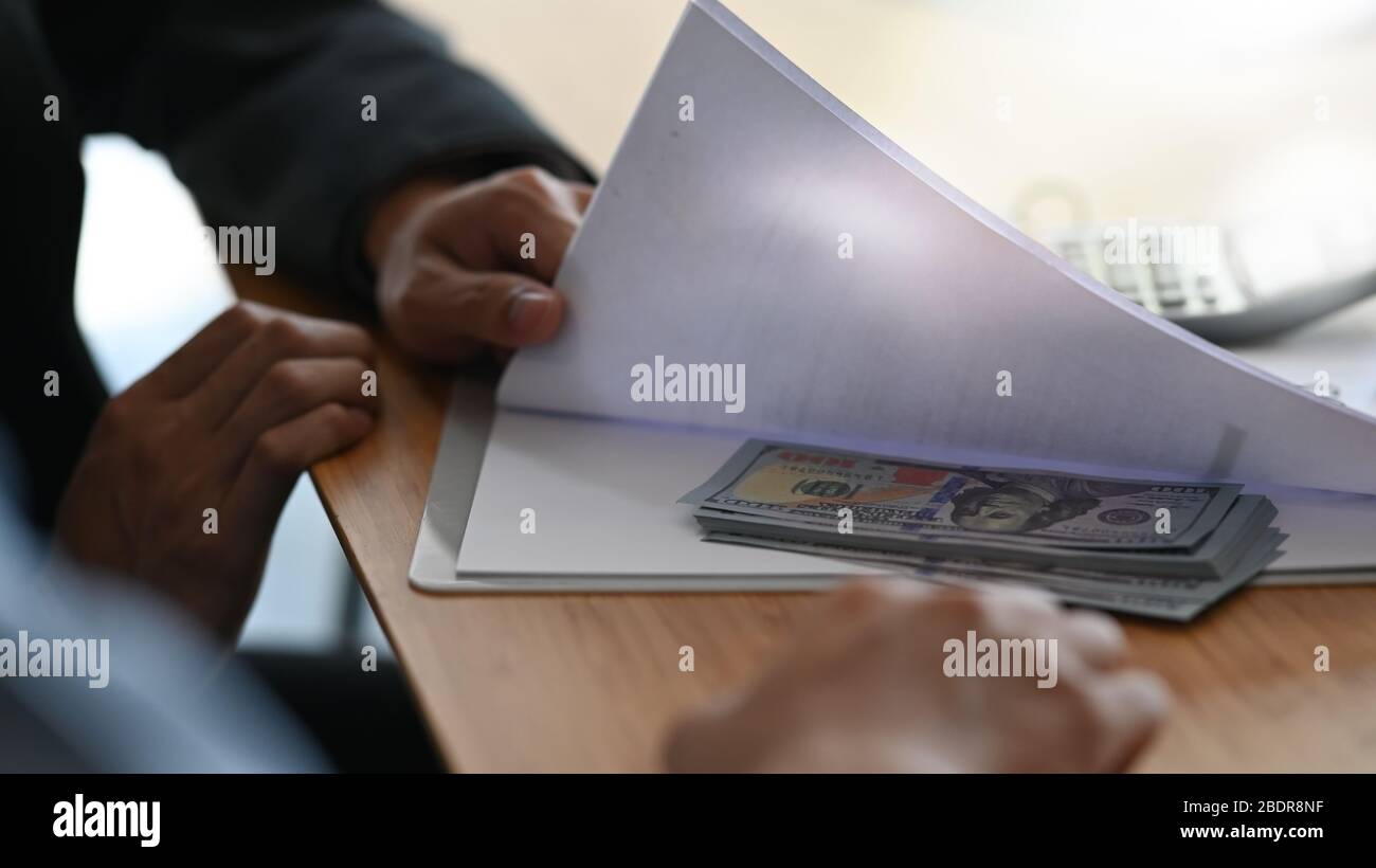 Pay under the table hi-res stock photography and images - Alamy