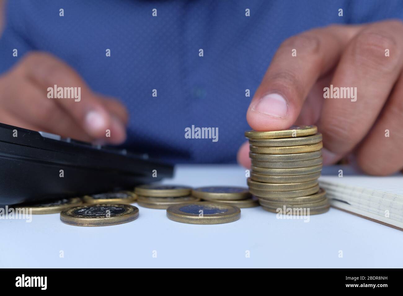 Man counting coins hi-res stock photography and images - Alamy