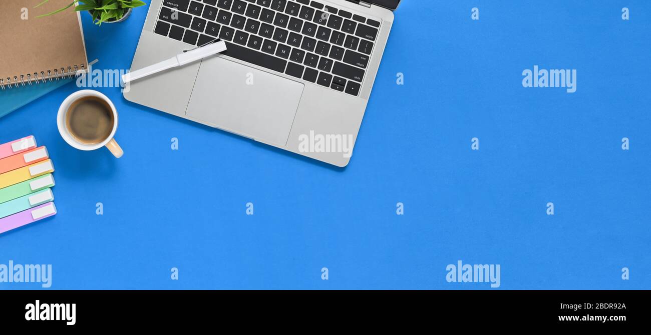 Simple Top view table - Creative flat lay Blue working desk with office ...