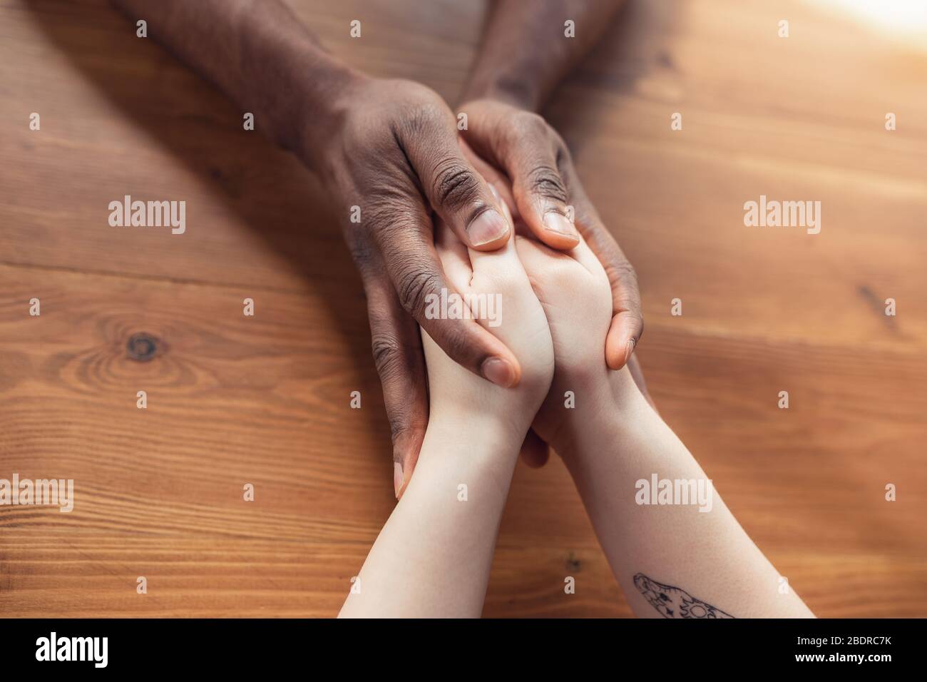 Close up hands multiethnic family hi-res stock photography and images ...