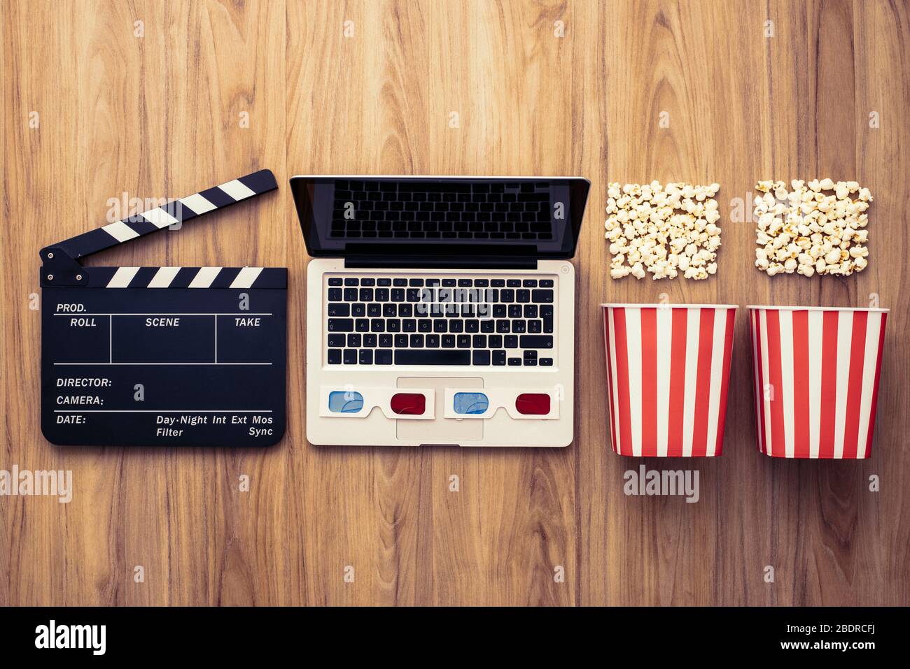 Laptop, clapper board, popcorn and 3D glasses: cinema streaming and ...