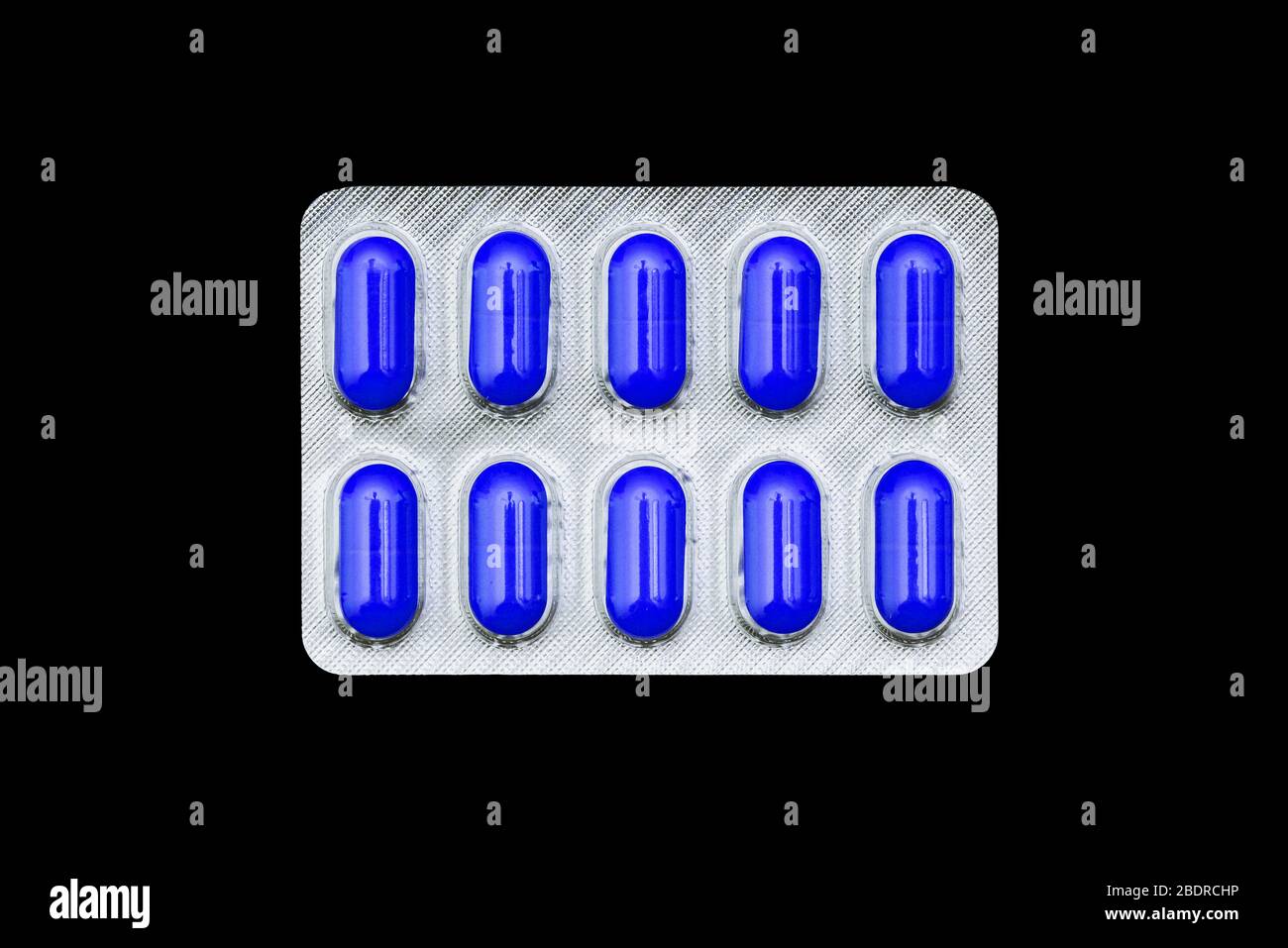Antibiotics in blue packaging on a black background. A medicine to ...