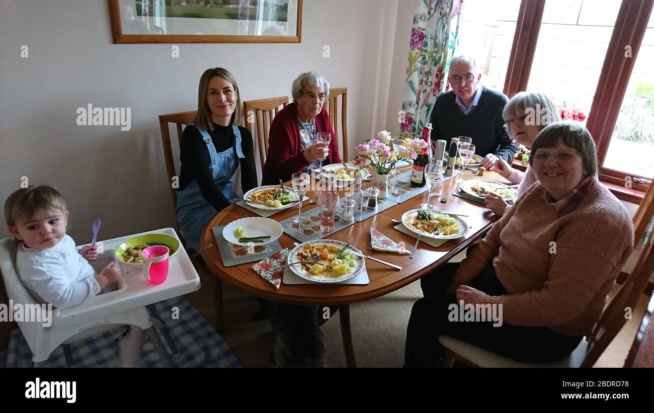 Family Meal, 3 generations, baby, mother, great grand mother Stock ...