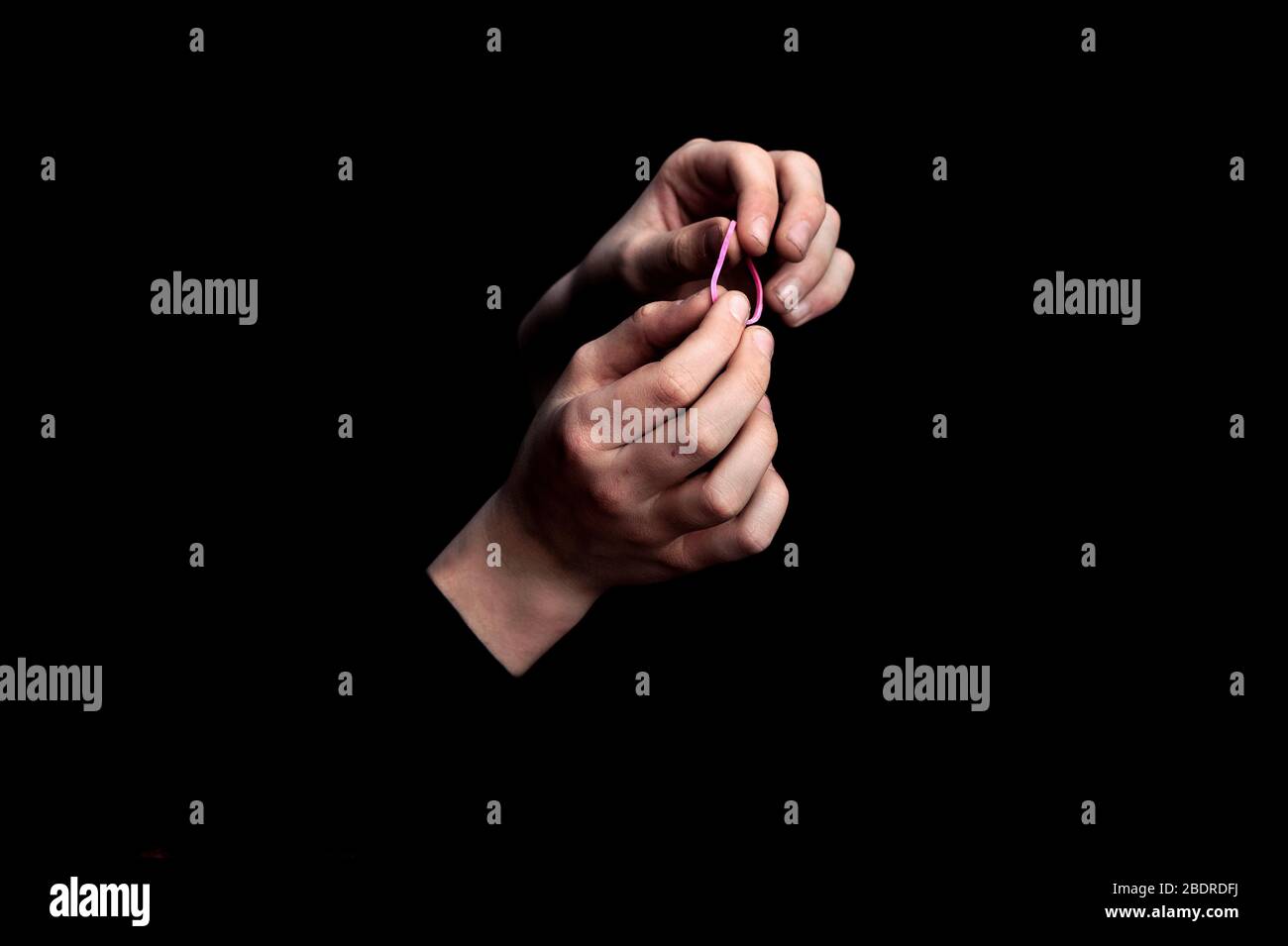 Rubber hand illusion hi-res stock photography and images - Alamy