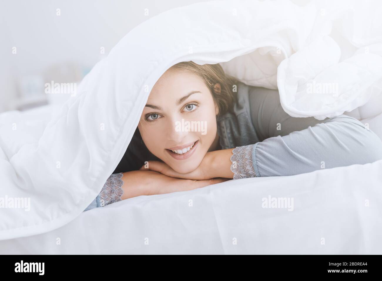 Hiding under bed covers hi-res stock photography and images - Alamy
