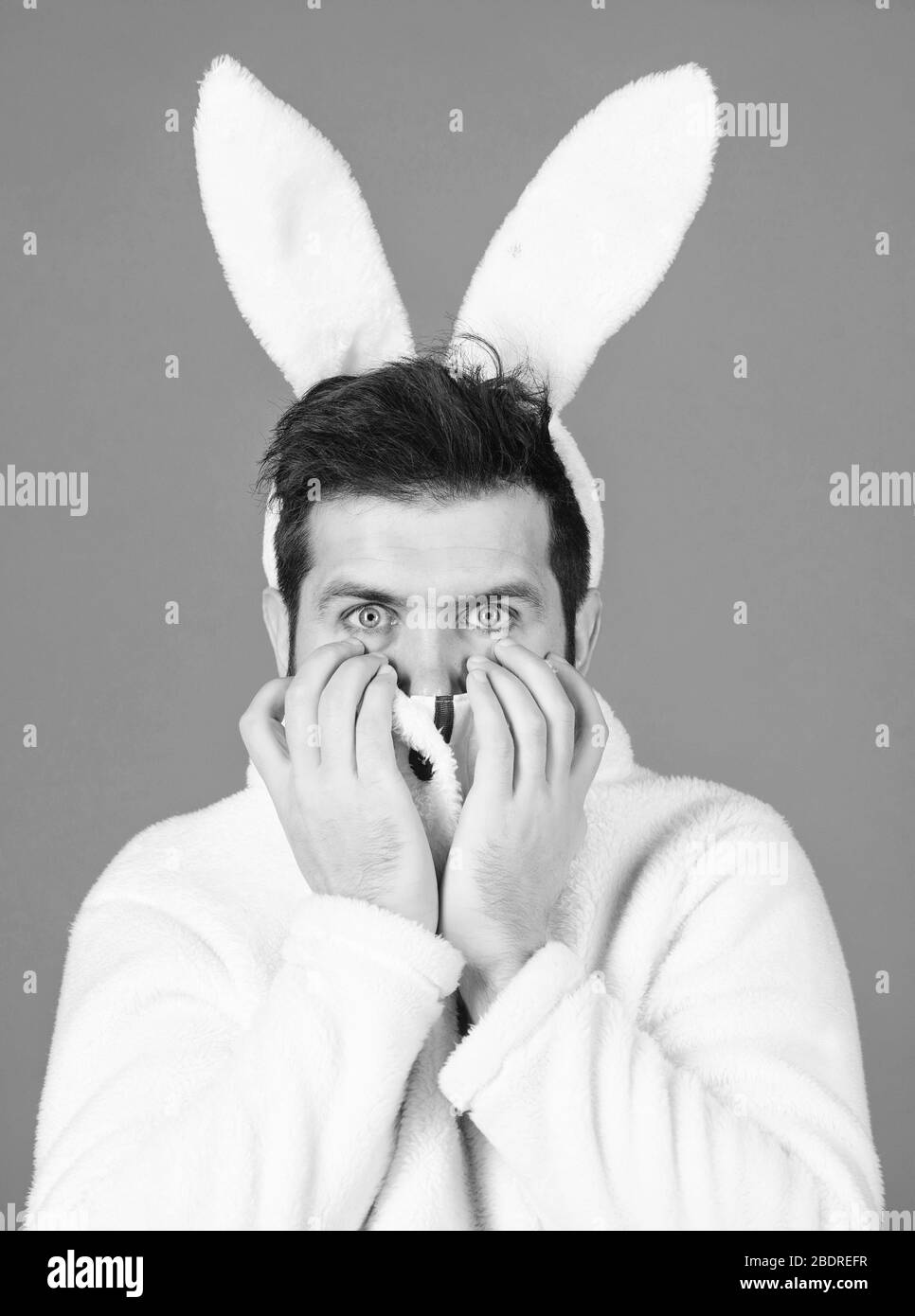 Man handsome face wear white bunny ears. Easter bunny. White bunny ...