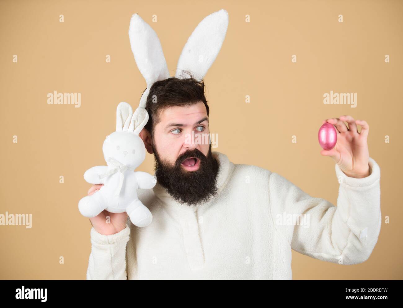 Easter rabbit. Man wearing rabbit suit. Funny bunny man soft ears ...