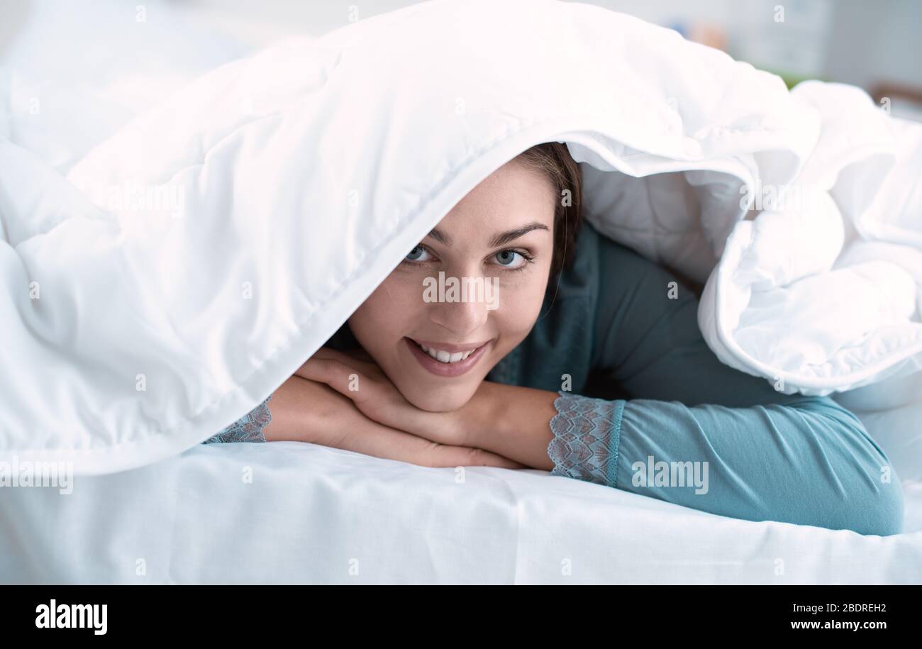 Hiding under bed covers hi-res stock photography and images - Alamy