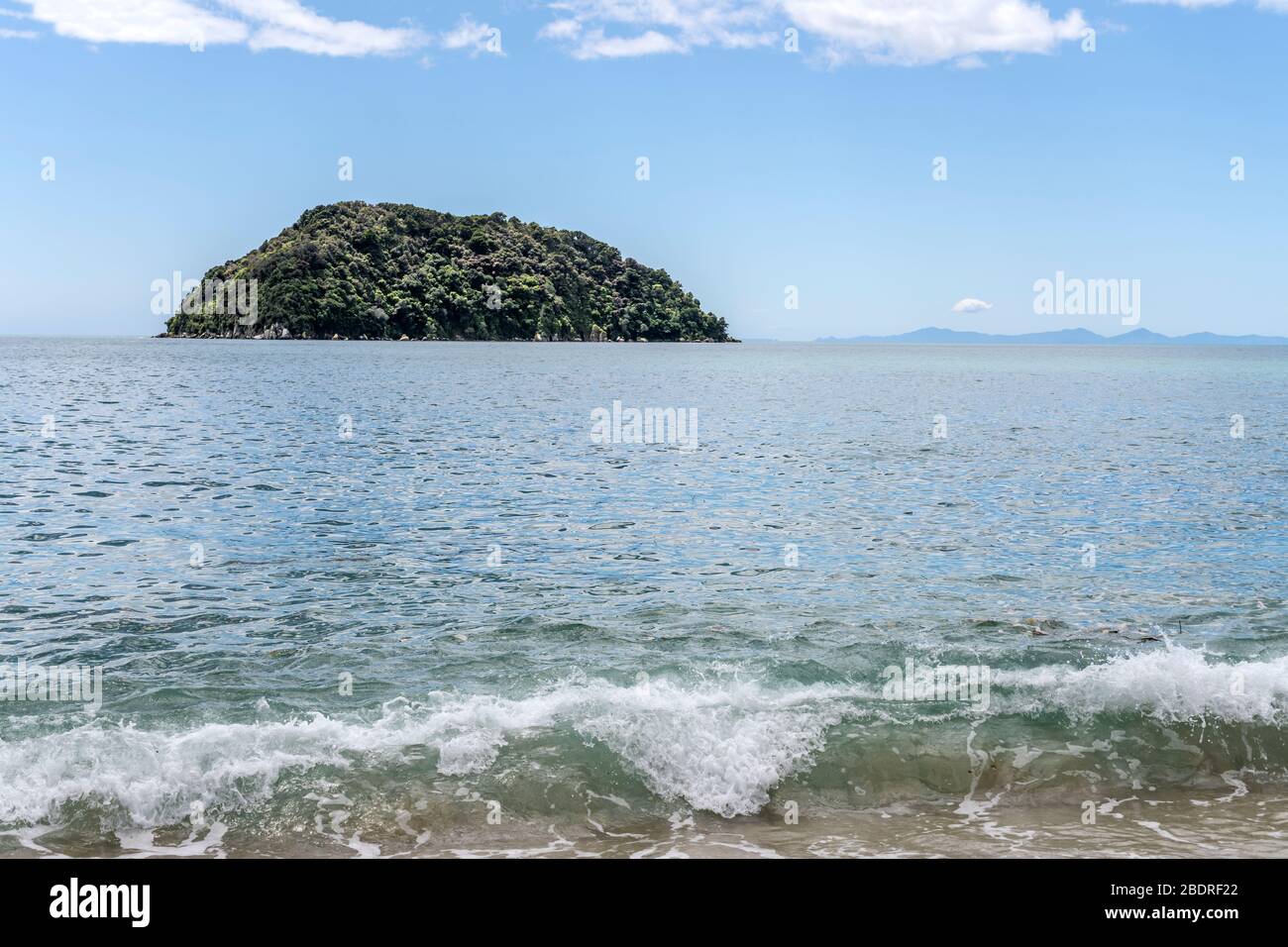 landscape of coast with green island at Tonga Quarry bay, shot in ...