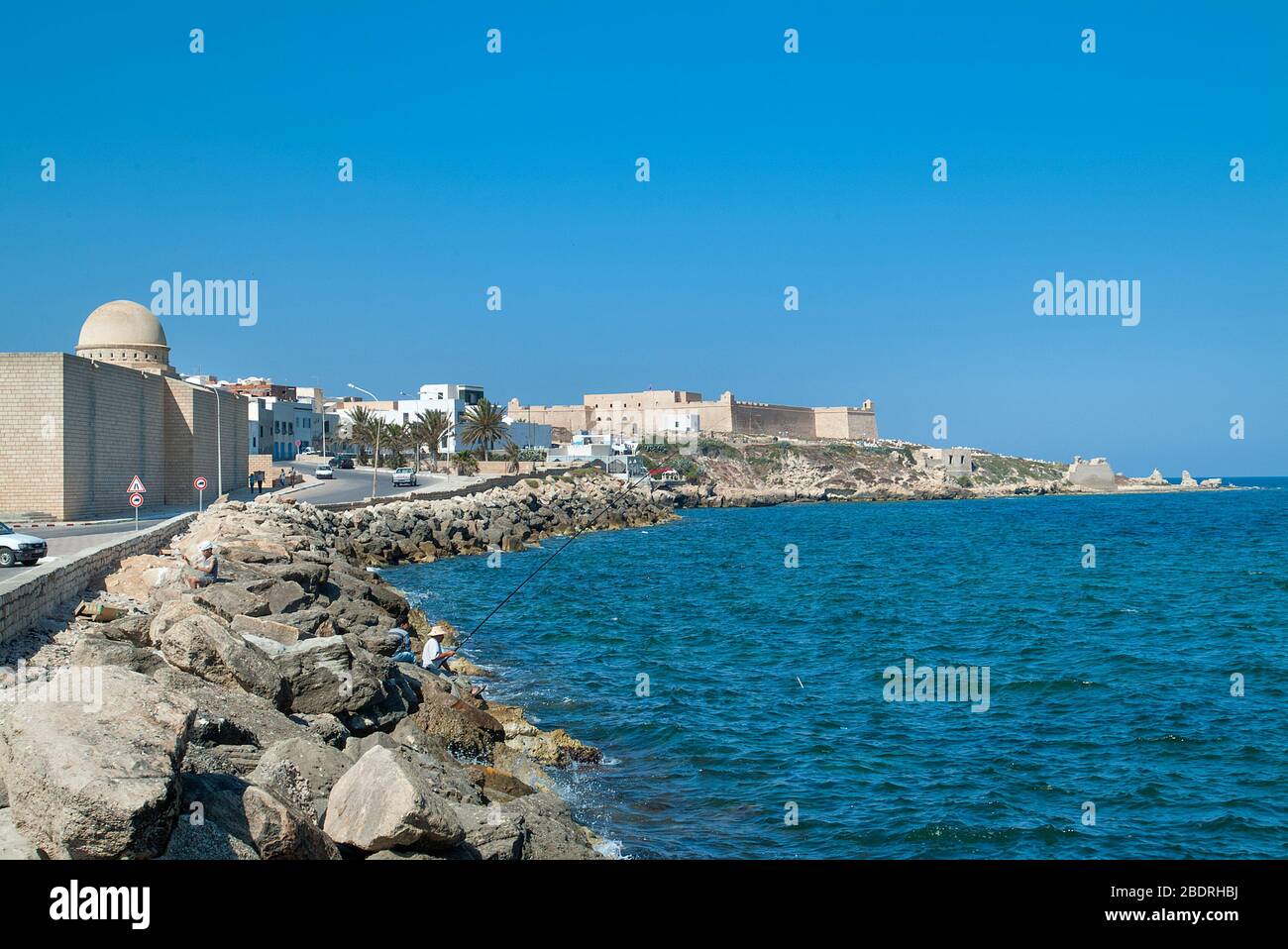 Sea front with Great Mosque of Mahdiya in foreground and Borj el Kebir ...