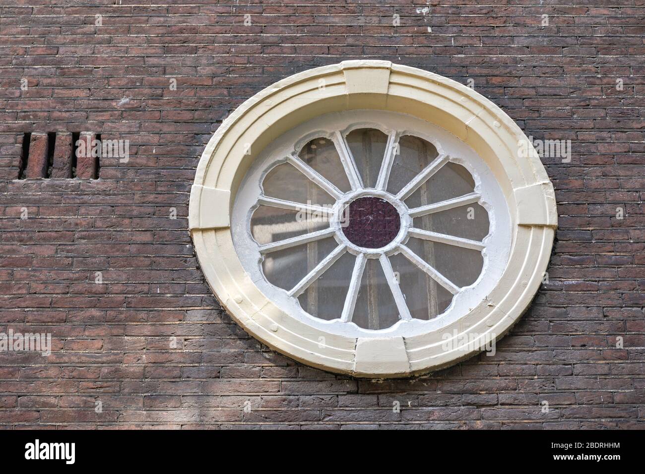 Round Rose Window at House in Amsterdam Stock Photo - Alamy