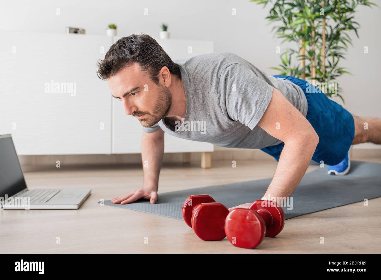 Watching tutorial hi-res stock photography and images - Alamy