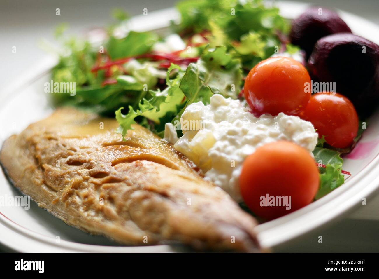 Healthy fish salad Stock Photo - Alamy