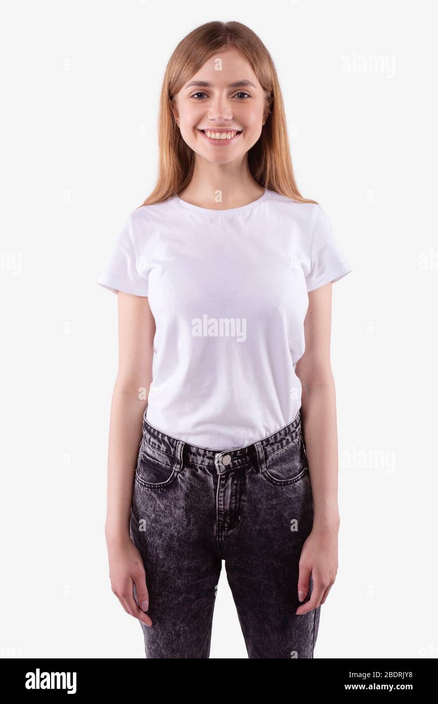 Attractive girl smiling, standing straight and looking directly at ...