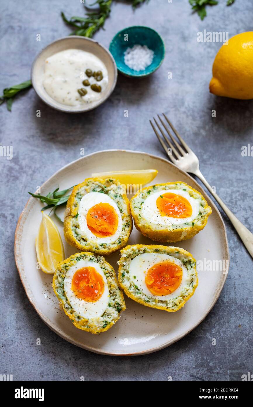 Scotch eggs wrapped with smoked haddock and cod Stock Photo - Alamy