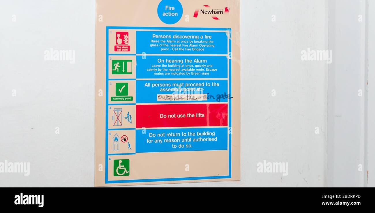 Fire action office workplace safety rules information Stock Photo - Alamy