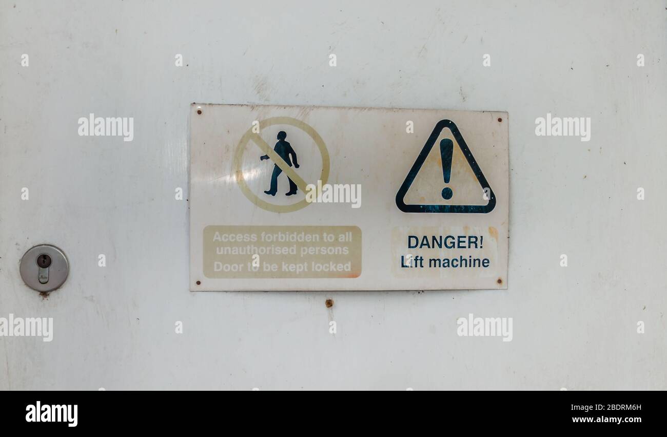 Danger lift machine Stock Photo - Alamy